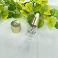 China Gold Empty Essential Oil Bottle 20ml 0.25ml Dosage UV Coating Liquid Dropper With Bulb for sale