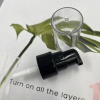 China PP Black Cream Pump Dispenser 20/410 304H Smooth Closure 0.2ML/T With Full Clear Cap for sale