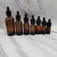 China 100ml Amber Glass Cosmetic Bottles Dropper Ratchet Closure Protect Children for sale