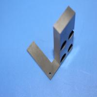 China Custom Non-Magnetic Alloy Four-Bore Contoured Component with Precision Holes for Tooling & Assembly for sale