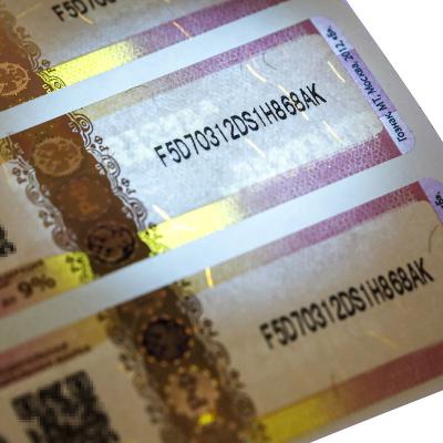China UV light anti-counterfeiting labels are used to prevent tampering to protect the brandfor high-grade cigarettes and wines for sale
