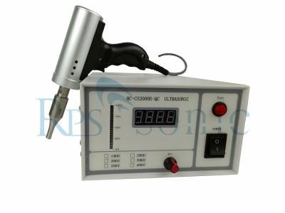 China 35Khz Pistol Type Ultrasonic Welding Equipment For Polyester Fabric Welding for sale