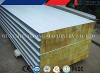 China Rock Glass Wool Foam Roof Sandwich Panel Roll Forming Machine for sale