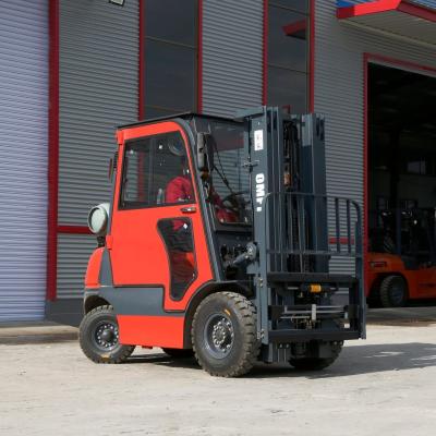 China Steel Rubber 2tons LPG Forklift with Cabin Nissan K21 K25 Engine Lift Height 3000-7000mm for sale