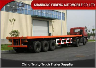 China Tri Axles Container transport  Flat Deck Truck Trailer With Mechanical Leaf Spring for sale