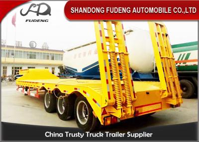 China Tri - axle heavy duty utility low bed trailer 60 tons with ramps and fuwa axles for sale
