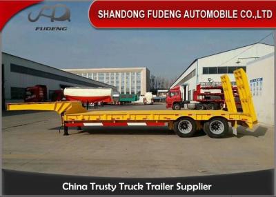 China 13 Meters 3 Axle Lowboy Trailer 60 Tons Hydraulic Ladder Yellow Color for sale
