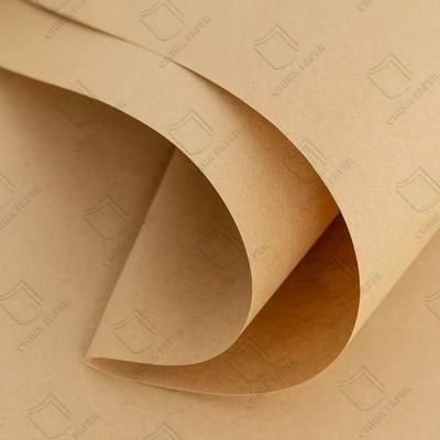 China 100% Pure Wood Pulp Kraft Paper Roll 600mm Width Brown Packaging Paper for Shipping Wrapping for sale