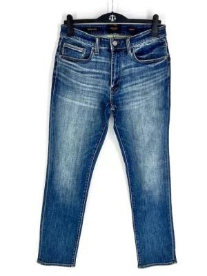 China Custom Logo Slim Fit Stretch Denim Jeans 63 Men's Fashion Casual Pants for sale
