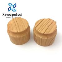 China 28mm Flip Top Plastic Bottle Caps Cosmetic Packaging Natural Bamboo Bottle Container Head for sale