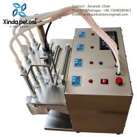 China Automatic Magnetic Stand Up Spout Pump Water Oil Yogurt Pouch Filling Packing Machine for sale