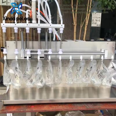 China Automatic Magnetic Stand Up Spout Pump Water Oil Yogurt Pouch Filling Packing Machine for sale