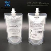China Custom Printed Plastic Placing Single Clear Stand Up Pouch Liquid Bags With Spout for sale