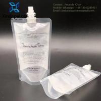 China Custom Printed Plastic Placing Single Clear Stand Up Pouch Liquid Bags With Spout for sale