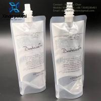 China Custom Printed Plastic Placing Single Clear Stand Up Pouch Liquid Bags With Spout for sale