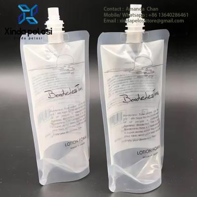 China Custom Printed Plastic Placing Single Clear Stand Up Pouch Liquid Bags With Spout for sale