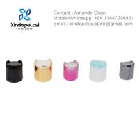 China Custom Color Cosmetic Bottle Caps Plastic Press Cap Disc Top Cap for sale