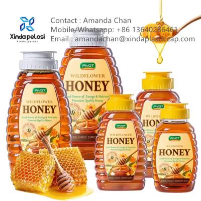 China PP Plastic Flip Top Cap With Silicone Valve For Squeeze Honey Condiment for sale