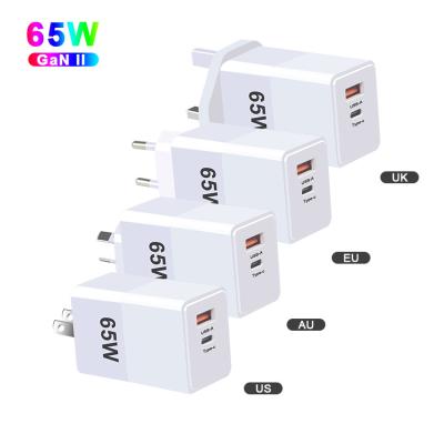 China 65W GaN PD Fast Charger with USB-C Port and Interchangeable US/EU/UK/AU Plugs for Laptops and Phones for sale