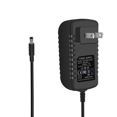 China 12V 1A Universal Travel Power Adapter AC to DC Converter with Interchangeable Plugs for sale