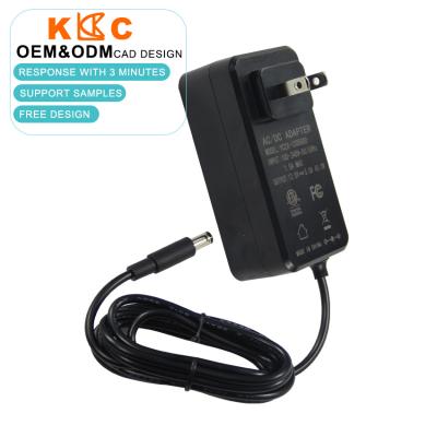 China 12V 5A 60W DC Power Supply US Plug 5.5x2.1mm Barrel Connector for LED Strip CCTV for sale