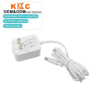 China 12V 1A US DC Power Adapter White 5.5x2.1mm AC to DC Wall Charger for Routers CCTV LED Strips for sale