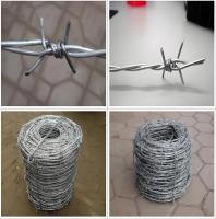 China BTO-22 Galvanized Razor Barbed Wire with 14 Gauge High Tensile Strength and 450mm Coil Diameter for Security Fencing for sale