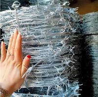 China BTO-22 Razor Barbed Wire Coil with 14 Gauge Core Wire and Hot Dipped Galvanized Coating for Security Fencing for sale
