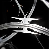 China CBT-65 Hot Dipped Galvanized Razor Barbed Wire with 500mm Outer Diameter for Border Protection for sale