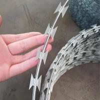 China CBT-65 Galvanized Razor Barbed Wire with 500mm Outer Diameter for Secure Perimeter Fencing for sale