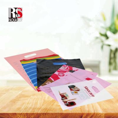 China Customized Handle Bag Plastic Packaging Handle Shopping Bags Lightweight And Portable Design Surface Pattern Printing for sale