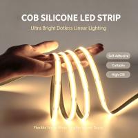 China 12V & 24V COB LED Strip Lights Self-Adhesive Ultra-Thin Flexible LED Tape for Cabinets for sale