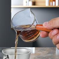 China 100ml Capacity Small Transparent Glass Coffee Cup with Lid and Double-Mouth Design for sale