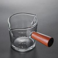 China 100ml Capacity Small Transparent Glass Coffee Cup with Lid and Double-Mouth Design for sale