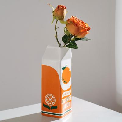 China Commercial Buyer Gifts Stores Modern Nordic Elegant Orange Fruit Ceramic Vase On-glazed for sale