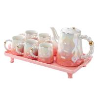 China Modern Shell Shaped Ceramic Coffee Mugs and Bamboo Saucer A Must-Have for Tea Parties for sale