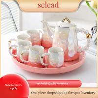 China Modern Shell Shaped Ceramic Coffee Mugs and Bamboo Saucer A Must-Have for Tea Parties for sale
