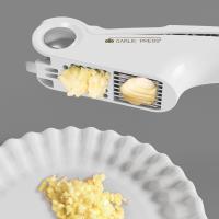 China Garlic Press and Slicer Kitchen Cooking Tool Set ABS Stainless-Steel Can Opener Utensils for sale