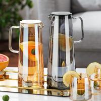 China 1.5L Glass Drinking Set Nordic-Style Iced Tea Lemonade Beverage Jug with Lids and Handle for sale