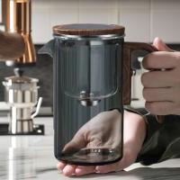 China 2024 Thickened Glass Tea Infuser with Walnut Handle Tea Strainers Custom Logo Stocked for sale