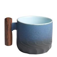 China Wooden Handle Bone Ceramic Teacup for Coffee or Camping Customizable Design for sale