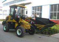China 0.6 CBM Rated Bucket Front End Wheel Loader , 37KW Rated Power Four Wheel Loader for sale