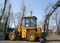 China Low Noise Tractor with Bucket and Backhoe Wing Spread Support Leg 0.3M3 Digger capacity for sale