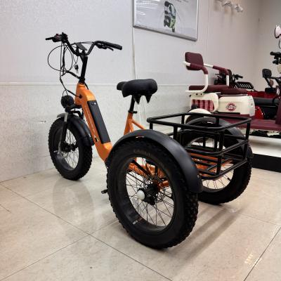 China Orange Off-Road Electric Tricycle with 48V 500W Dual Motor and 20×4.0 Tires for Outdoor & Urban Use for sale