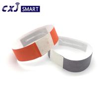 China Disposable RFID NFC Wrist Band Smart Weatherproof Dupont Paper Material for sale