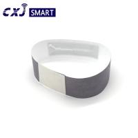 China Disposable RFID NFC Wrist Band Smart Weatherproof Dupont Paper Material for sale