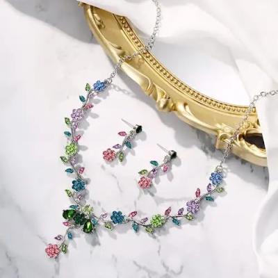 China 925 Sterling Silver Leaf Cluster Flower Crystal Jewelry Set with AAA Zirconia - 30pcs MOQ Custom Pendant & Earrings for sale