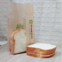 China Stand Up Packing Food Customized Kraft Paper Bags Clear Window For Bread for sale