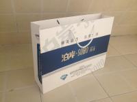 China Flowery Kraft Paper Customized Paper Bags With Ribbon Handle for sale