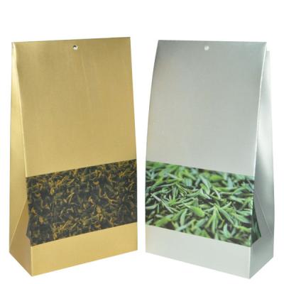 China Yellow Silvery Matte Finish Plastic Packaging Bag With Square Bpttom For Tea for sale
